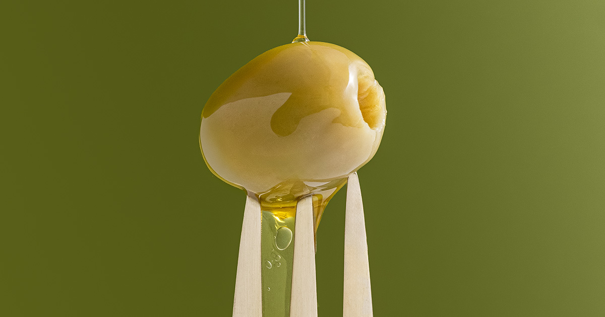 Solid olive color surface for flat lay styling and product photography